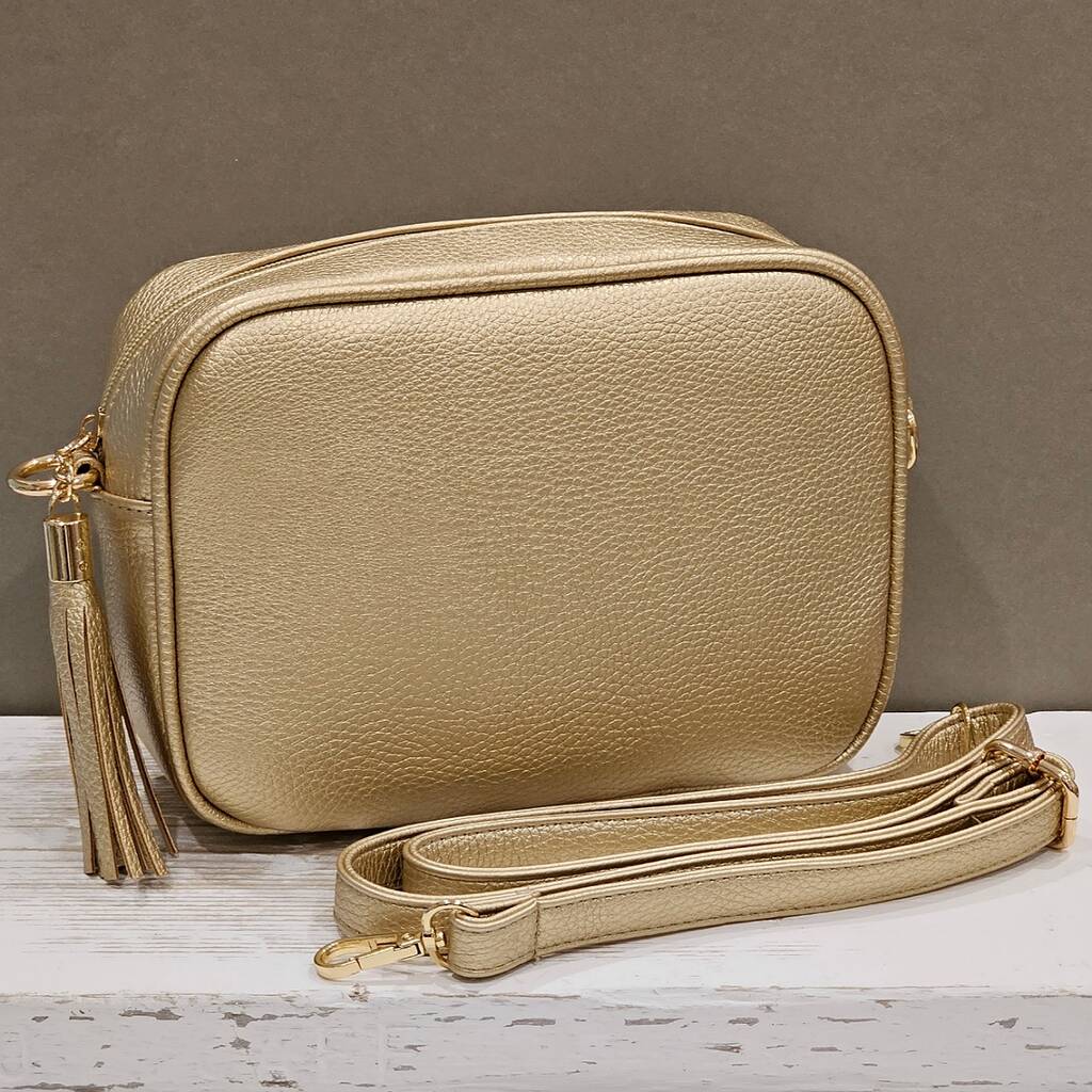 Single Zip Cross Body Bag With Tassel In Gold By Nest ...