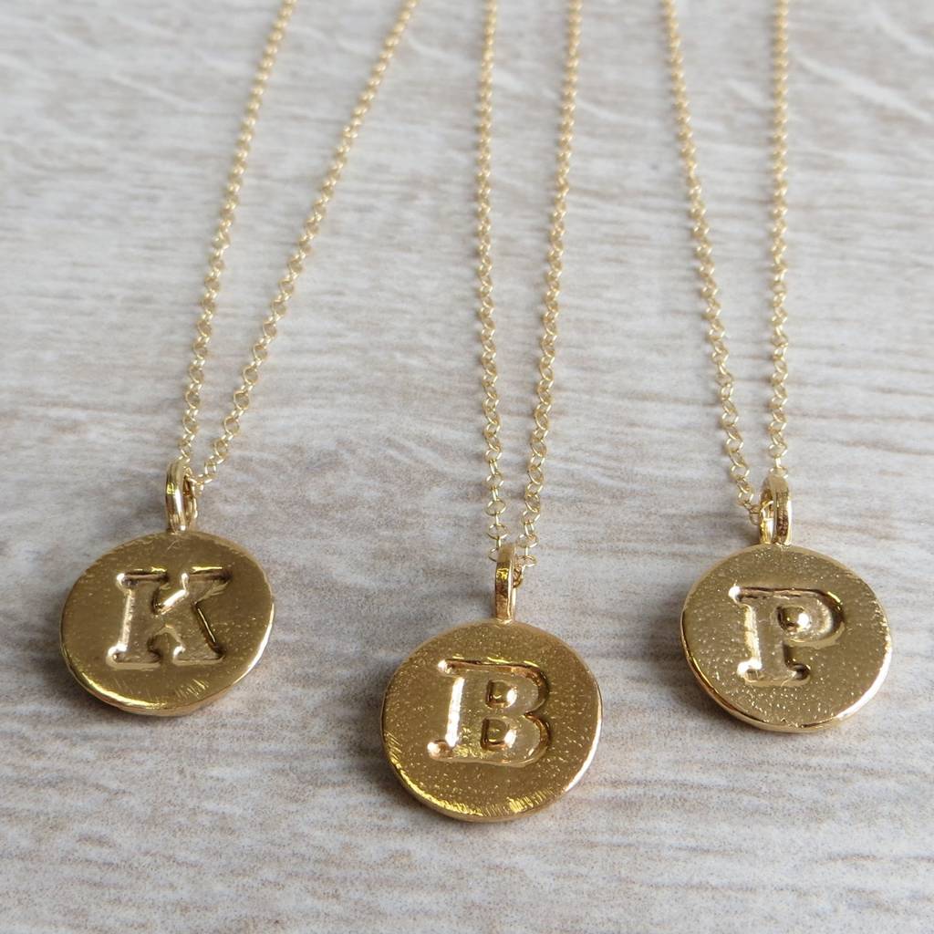 gold embossed letter necklace by gracie collins | notonthehighstreet.com