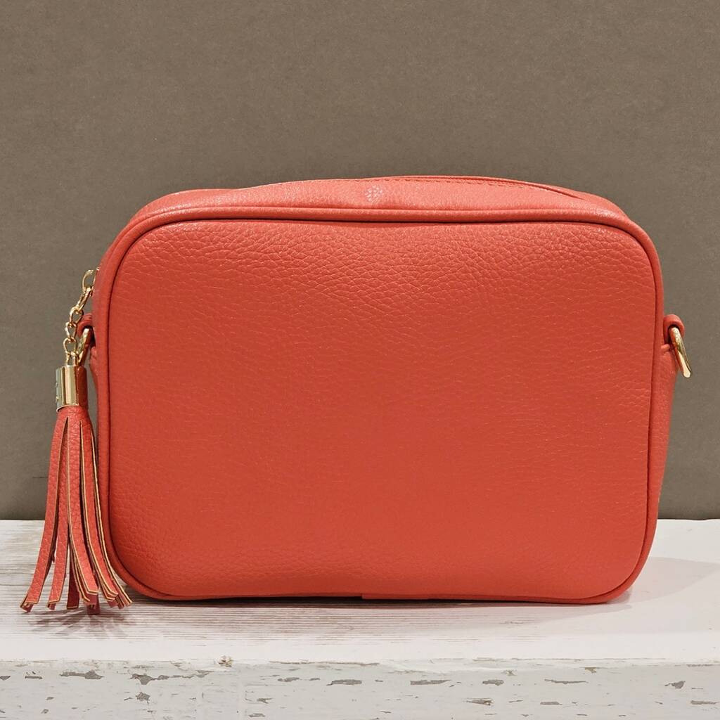 Single Zip Cross Body Bag With Tassel In Coral By Nest ...