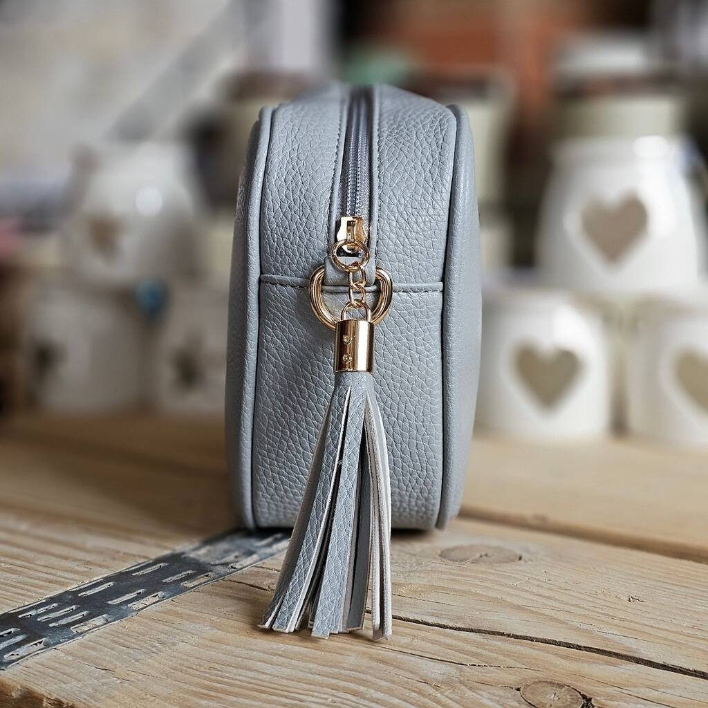 Single Zip Cross Body Bag With Tassel In Grey By Nest Gifts