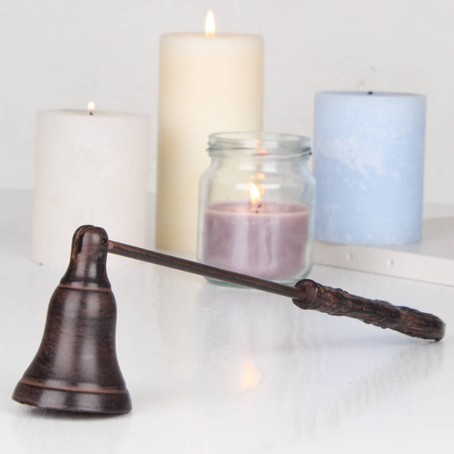 antique bronze iron candle snuffer by dibor | notonthehighstreet.com