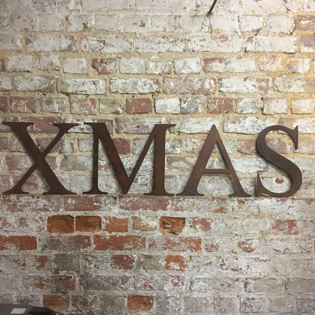 rusted xmas christmas decoration letters sign by the rustic warehouse ...