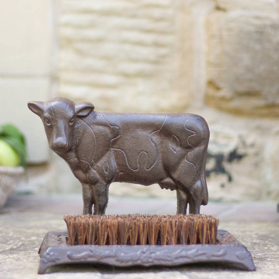 cast iron cow boot brush by dibor | notonthehighstreet.com