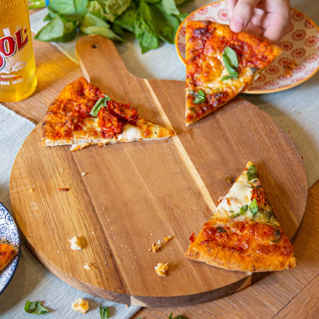 Wooden Pizza Serving Board By Duncan Stewart | notonthehighstreet.com