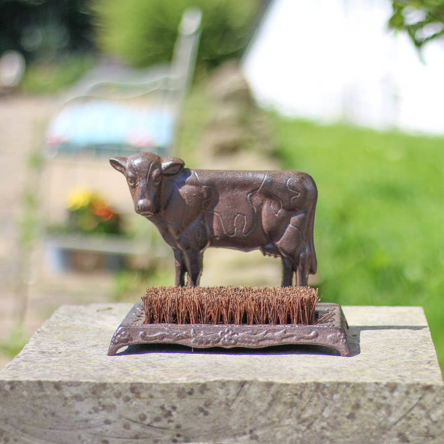 cast iron cow boot brush by dibor | notonthehighstreet.com