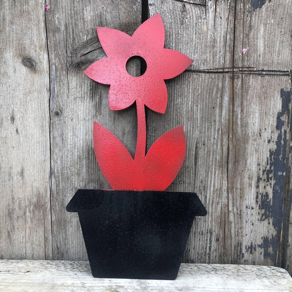 rusted coloured plant flower pot silhouette sign by the rustic ...