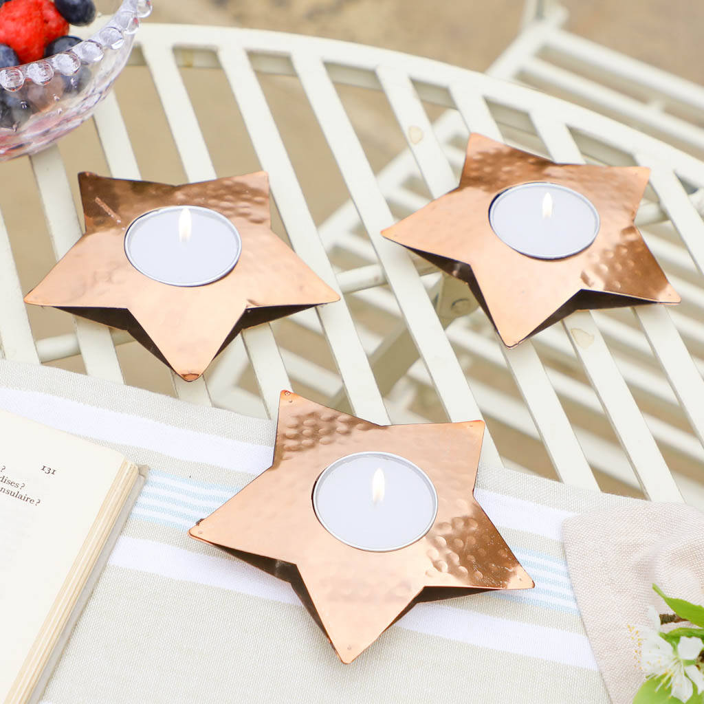 Set Of Three Copper Star Tea Light Holders By Dibor
