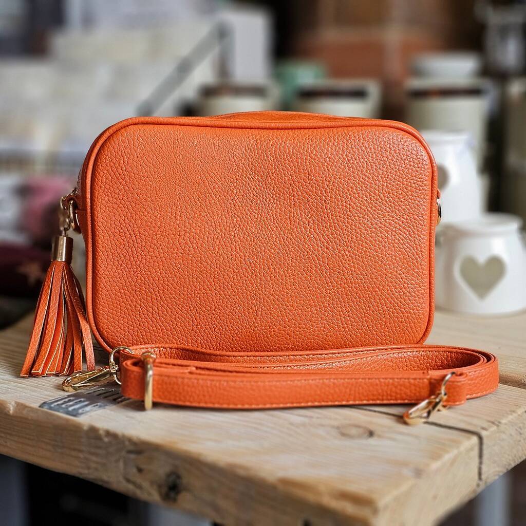 Single Zip Cross Body Bag With Tassel In Orange By Nest Gifts