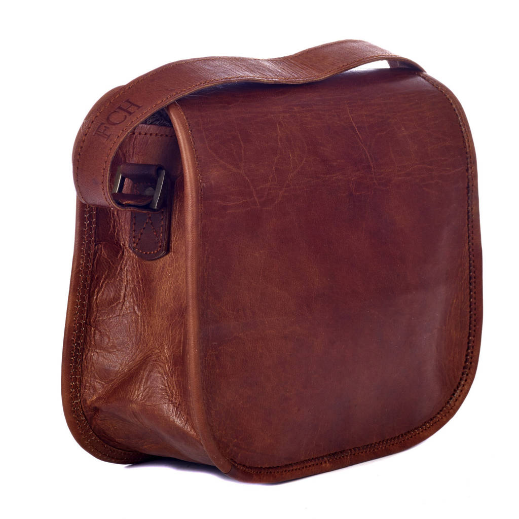 personalised curved brown leather saddle bag by paper high ...