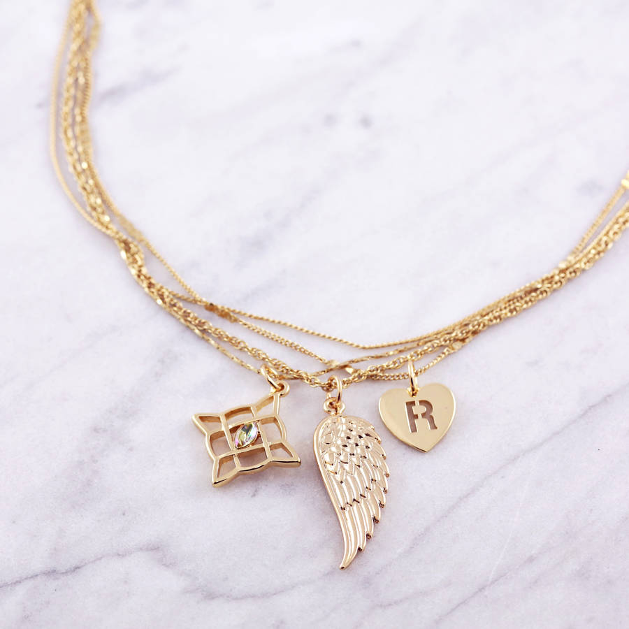 multi layered angel wing necklace by j&s jewellery | notonthehighstreet.com