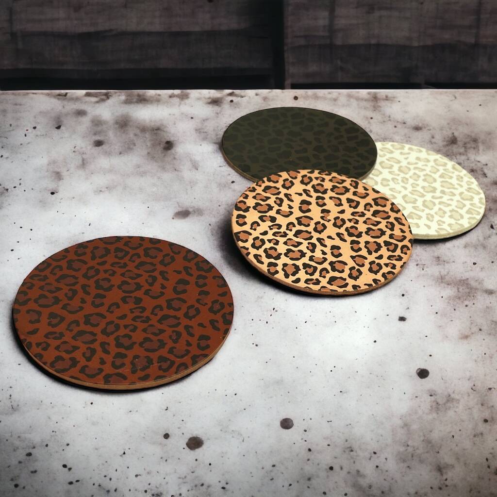 Set Of Four Leopard Print Leather Coasters By Holdall & Co