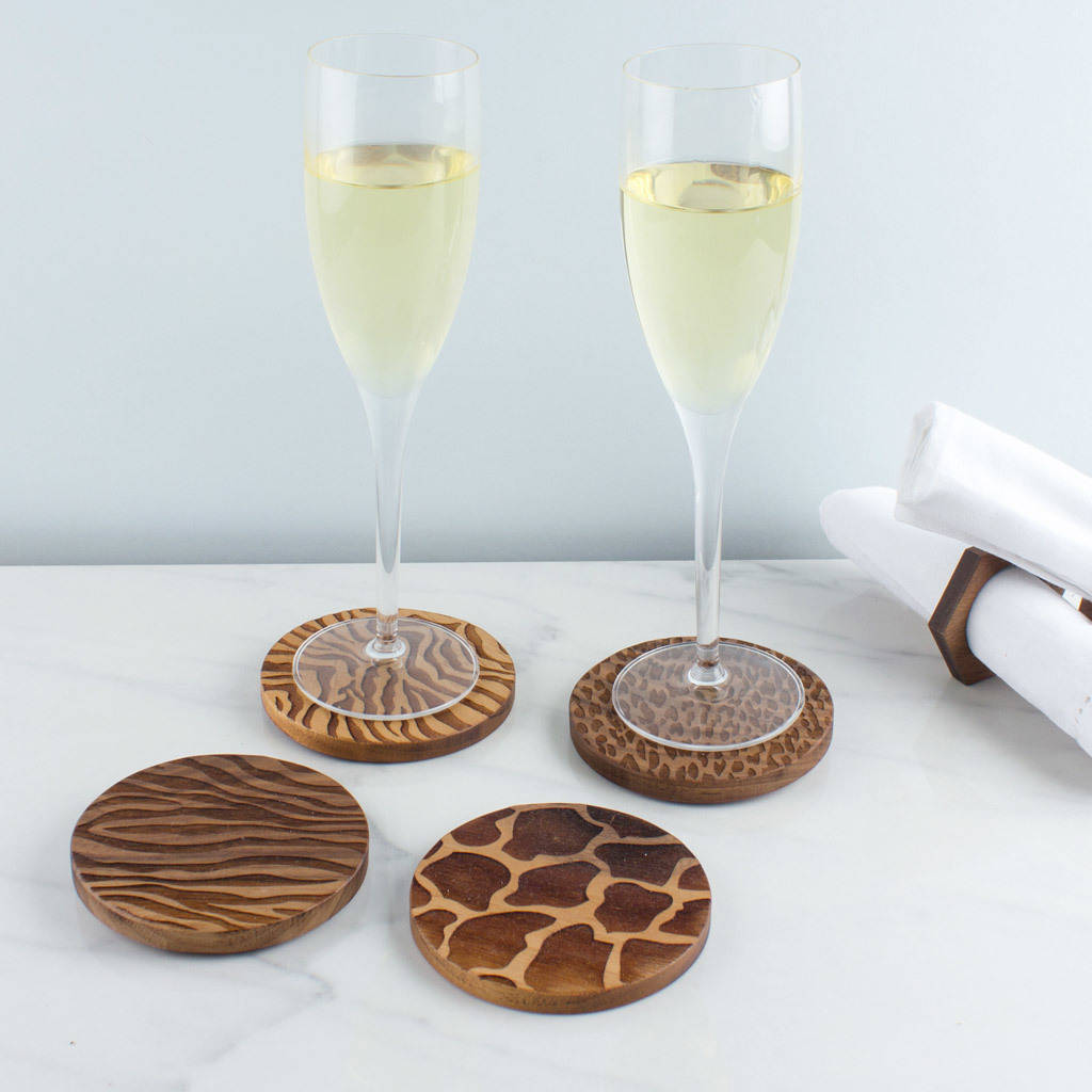 wood animal print coaster set by create gift love | notonthehighstreet.com