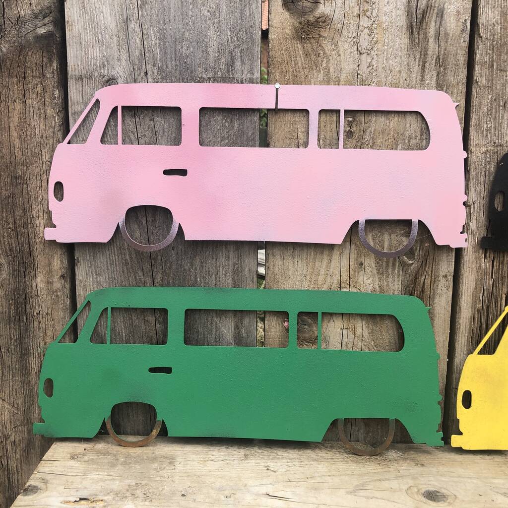 rusted metal camper van sign by the rustic warehouse ...