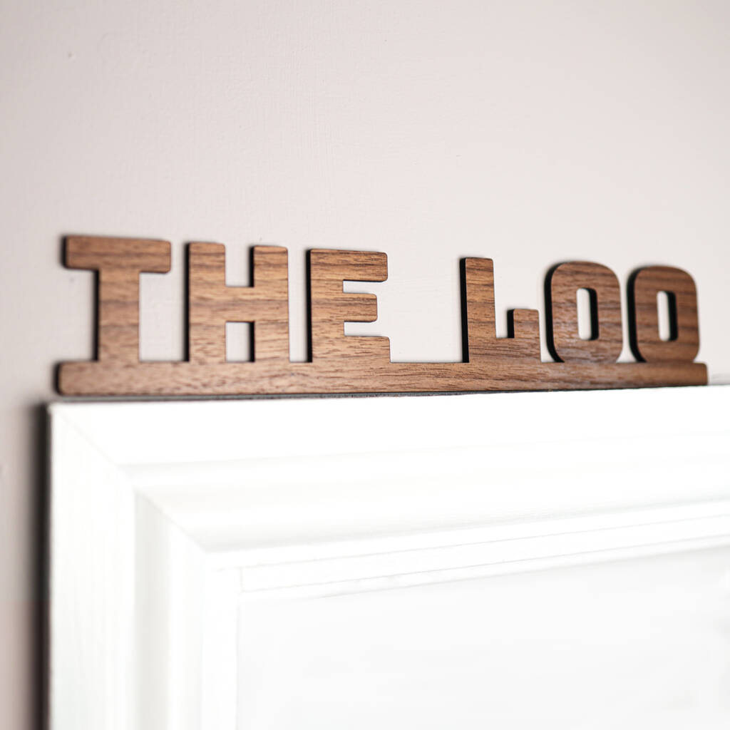 The Loo Sign: Walnut Wood Door Topper With Adhesive Dots By Noir.Design