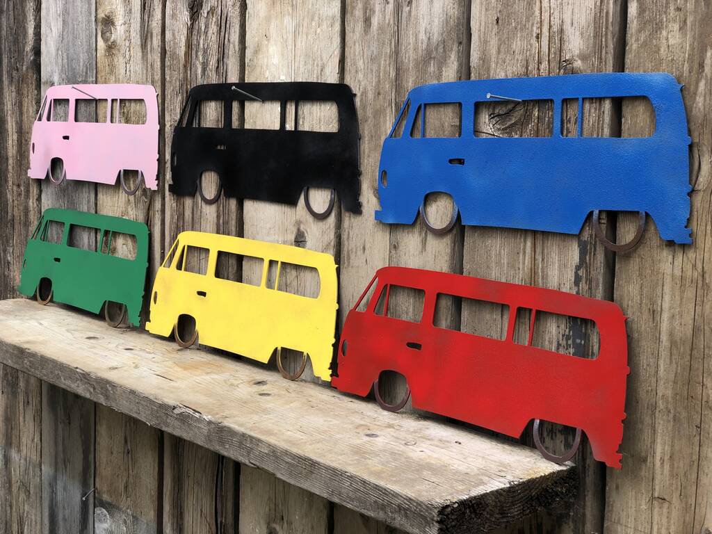 rusted metal camper van sign by the rustic warehouse ...