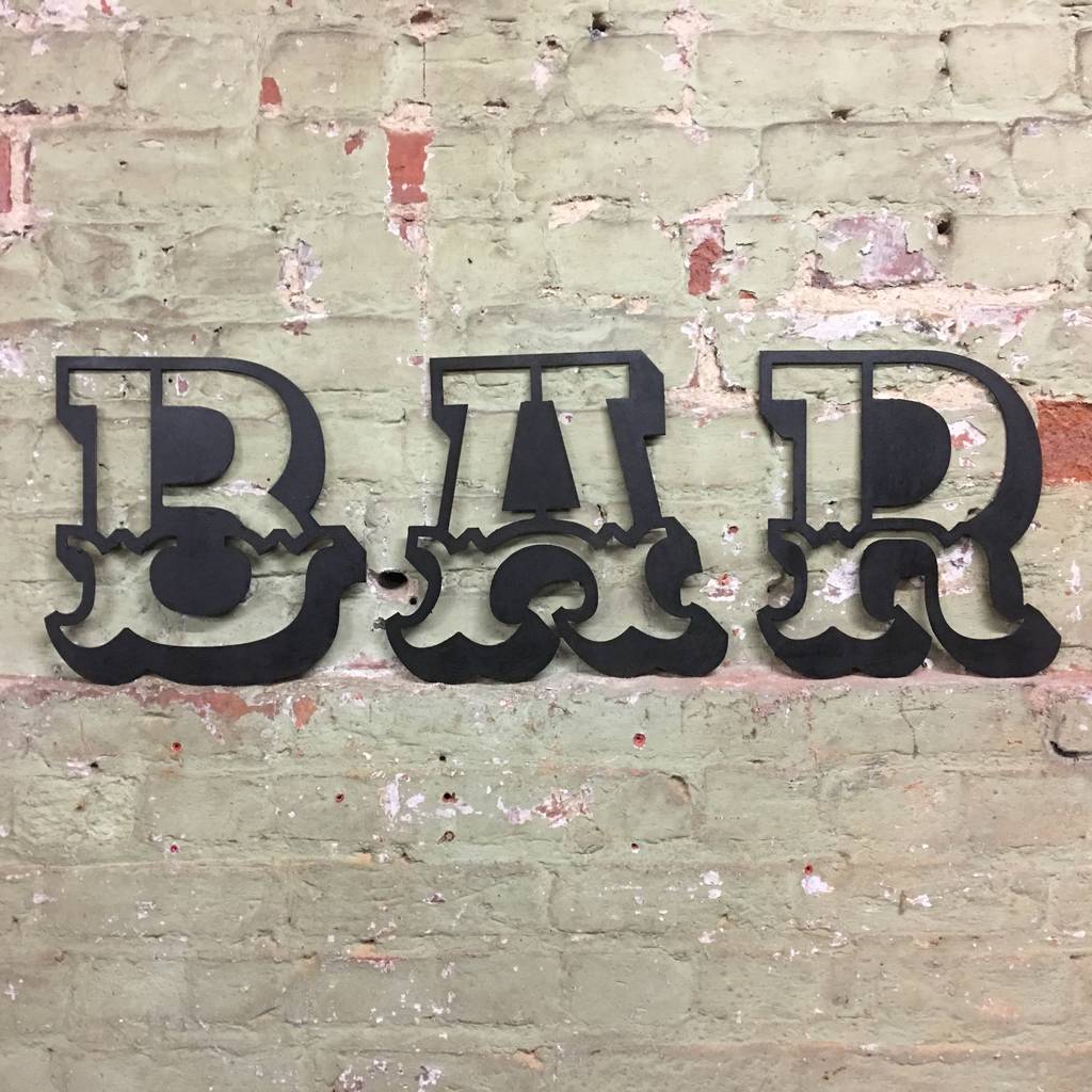 industrial looking metal bar letter sign by bobo's beard company ...