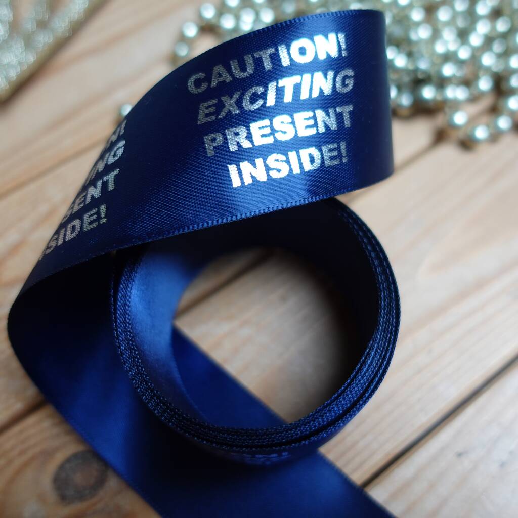 Purple 'Exciting Present!' Joke Ribbon By Yellow Green Blue ...