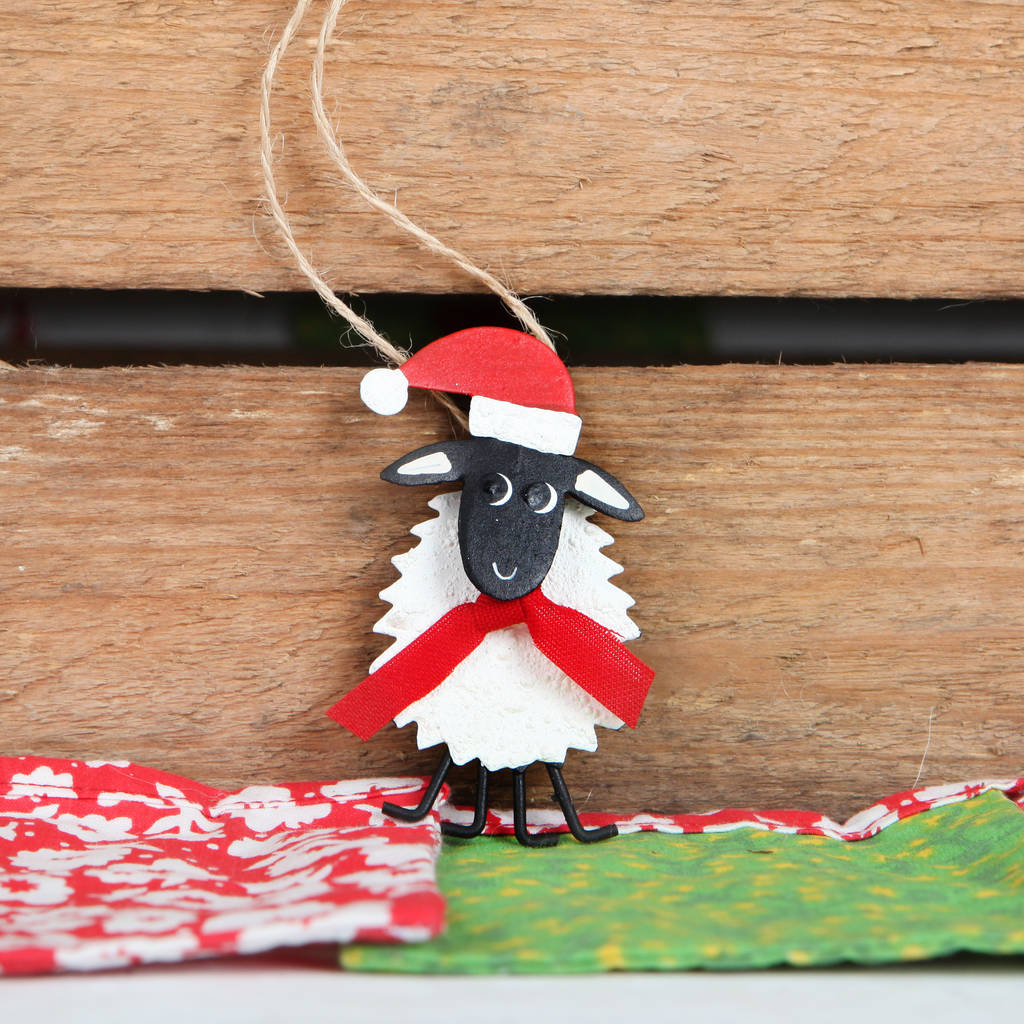 christmas sheep in santa hat tree decoration by red berry apple ...