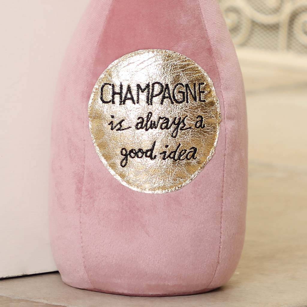 pink velvet champagne door stop by dibor | notonthehighstreet.com