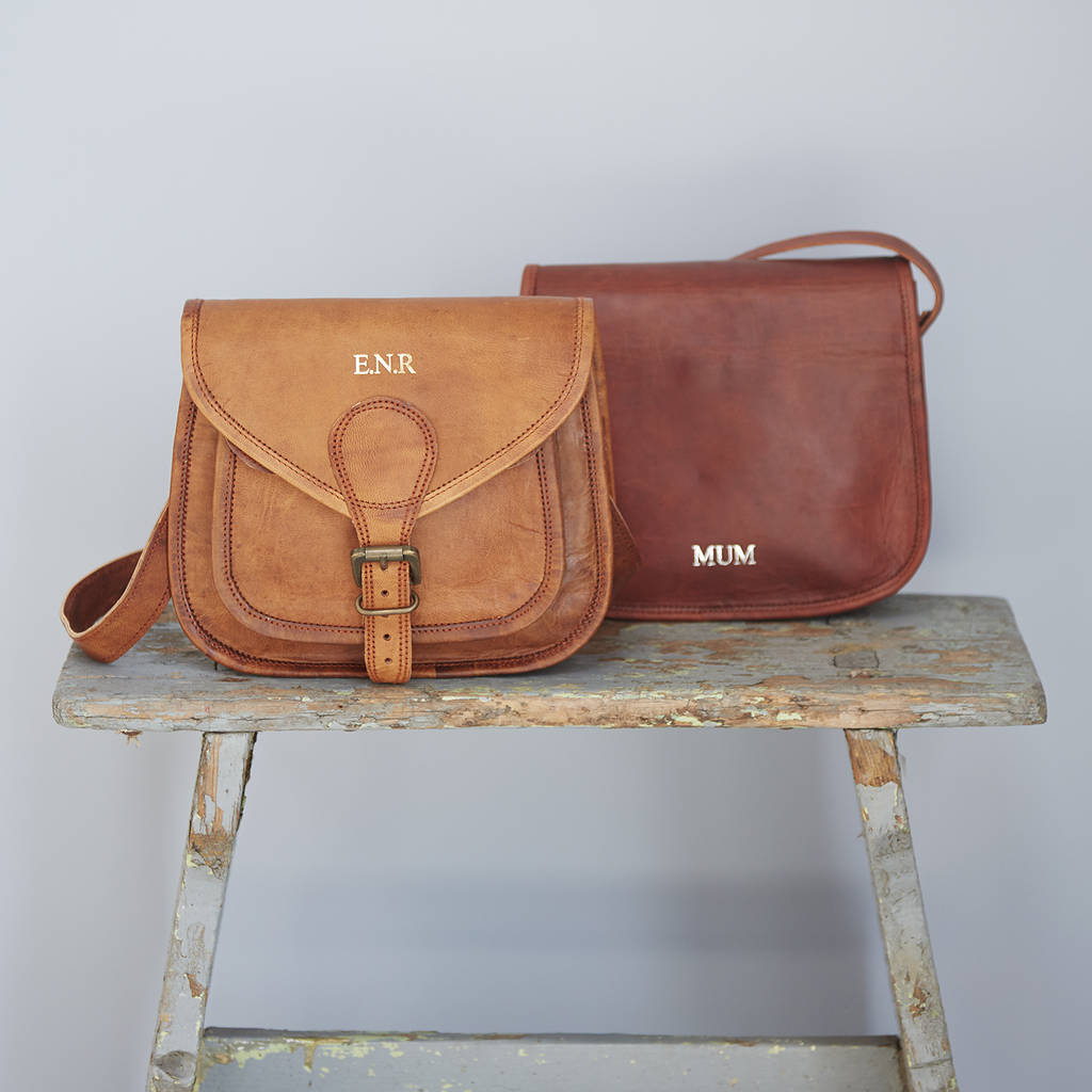 personalised curved brown leather saddle bag by paper high ...