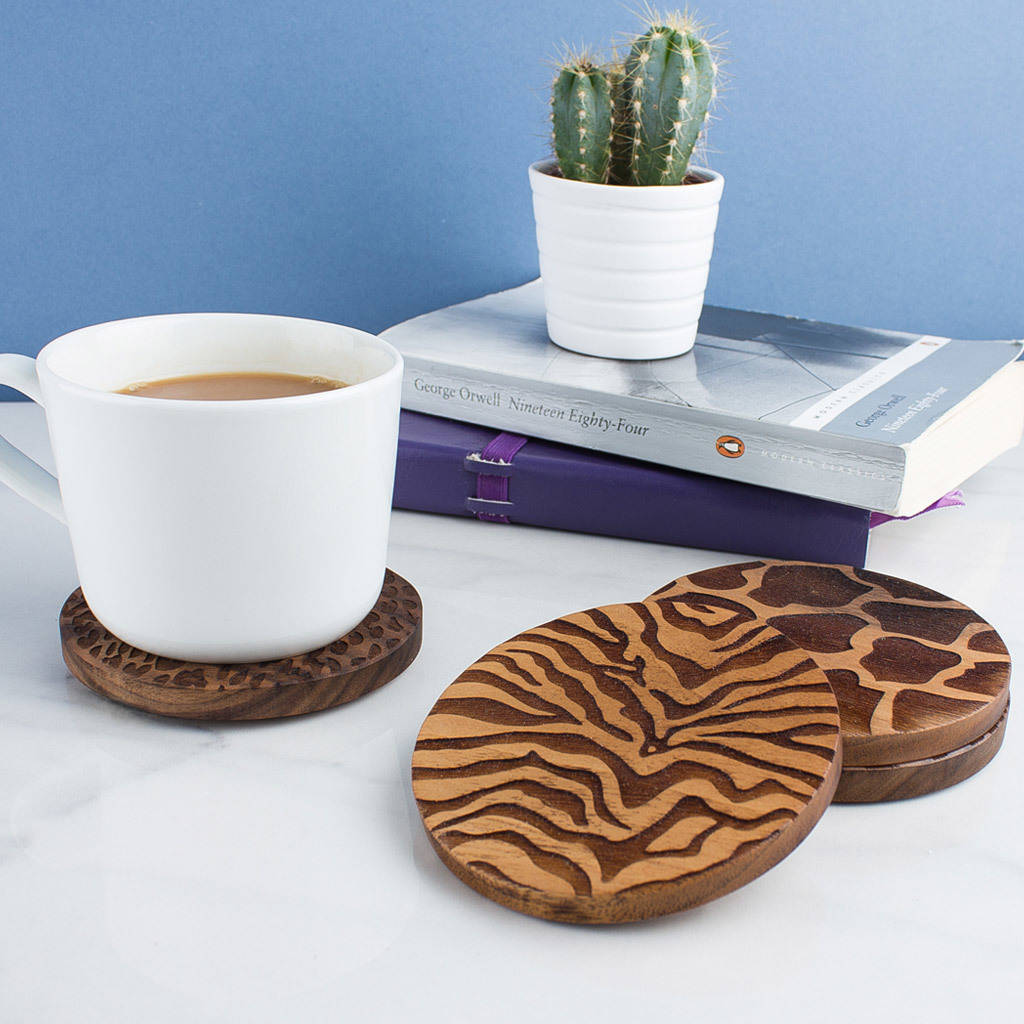 wood animal print coaster set by create gift love | notonthehighstreet.com