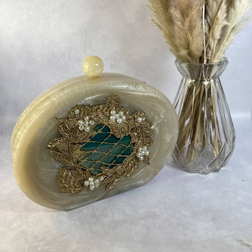 Ivory Oval Resin Clutch By SRCOLLECTION | notonthehighstreet.com