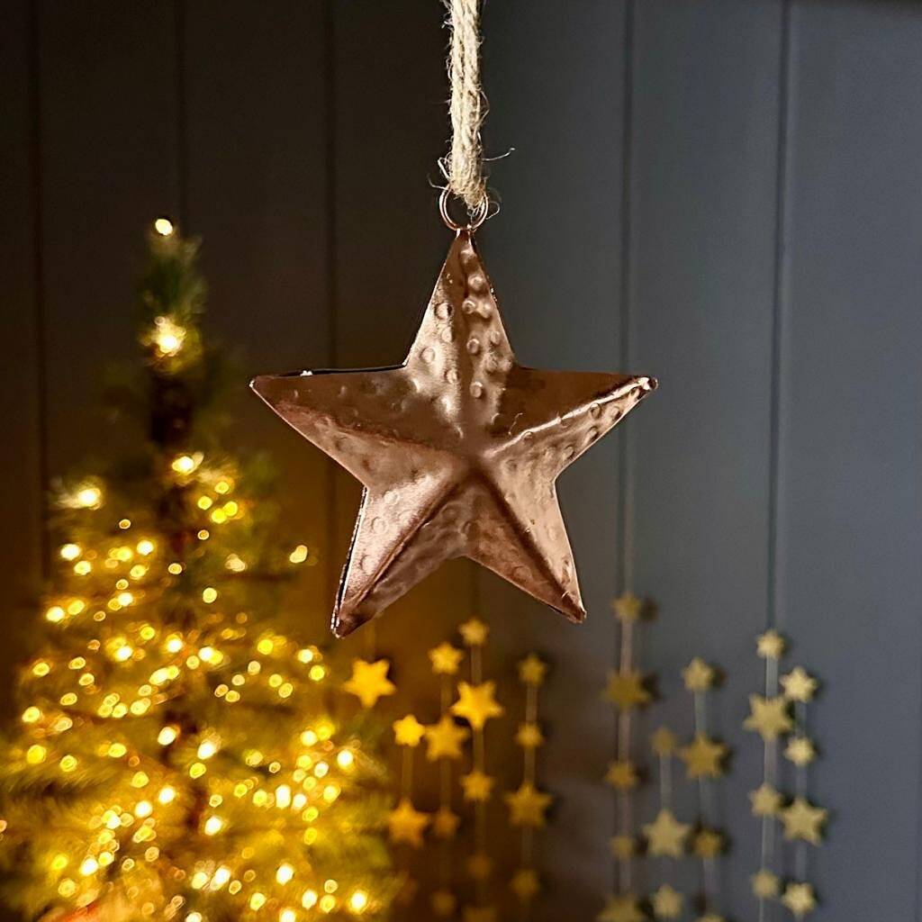 Hammered Iron Star Hanging Decoration In Rose Gold By Nest Gifts