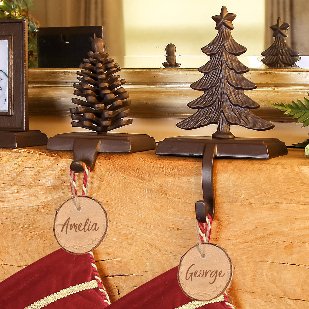 pair of cast iron christmas stocking holders by dibor ...