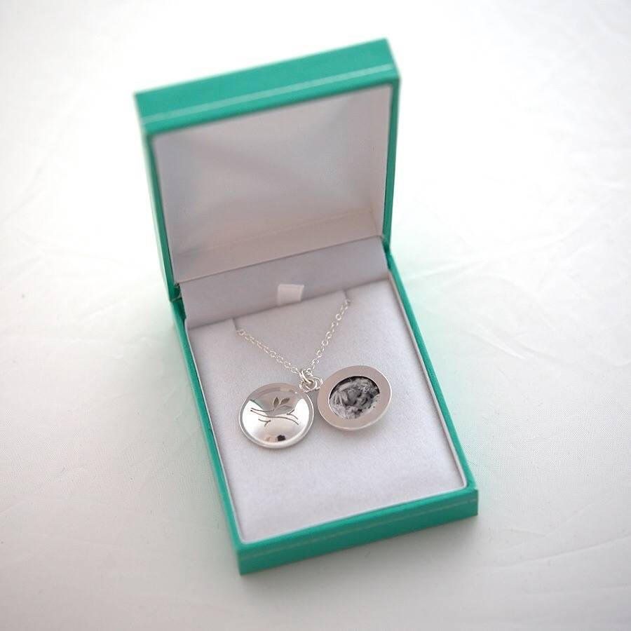 mini round locket by elizabeth designs | notonthehighstreet.com